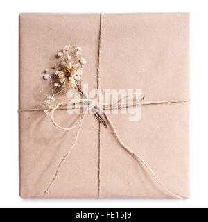 parcels boxes with kraft paper, on wooden table on grey background ...