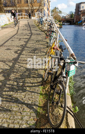 Bicycles parked on Kingsland Basin footbridge, London England United ...