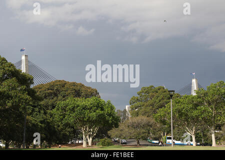 The Australian flag flies over the ANZAC Bridge viewed from ...