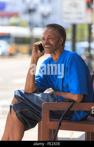Man with Traumatic Brain Injury using a bank ATM Stock Photo - Alamy