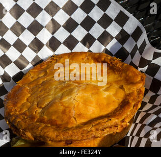 Homemade Chicken Pot Pie on a white plate on a white wooden background ...