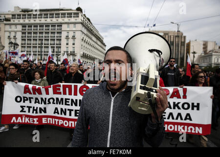 Athens, Greece. 4th Feb, 2016. Strikers hold banners an shout slogans ...