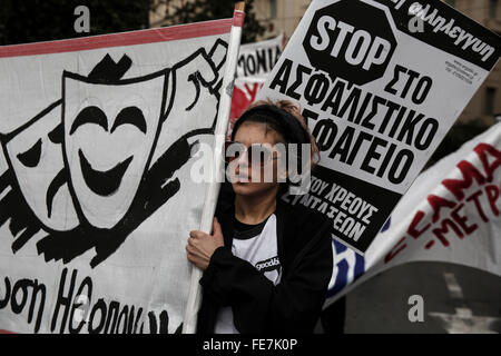Athens, Greece. 4th Feb, 2016. Strikers hold banners an shout slogans ...