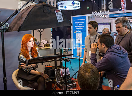 Stand with model being photographed at NEC Photography Show & The Video ...