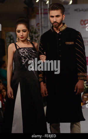 Models present creation by Pakistani designer Faiza Samee during the ...