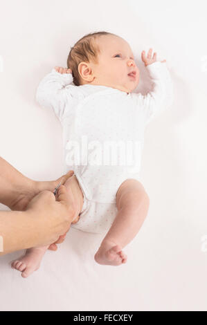 Pediatrician or nurse ready to give an intramuscular injection of a ...