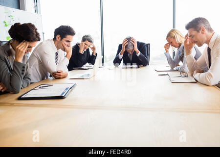 Business team hungover at meeting Stock Photo - Alamy