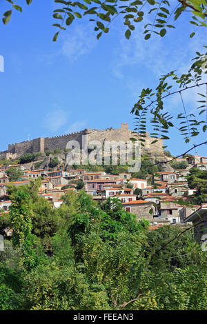 Medieval castle of Molyvos, Lesvos island, Greece and the Greek flag ...