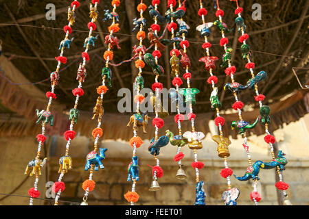 An Indian traditional wind chimes selling by street vendor. Focus ...