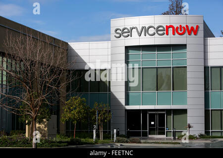 A logo sign outside of the headquarters of ServiceNow in Santa Clara ...