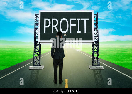 Business and finance concept. On the asphalt between the white dividing ...