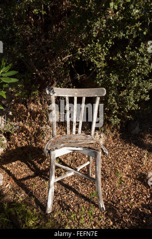 old damaged chair, worn, broken and dirty leather in different angles ...