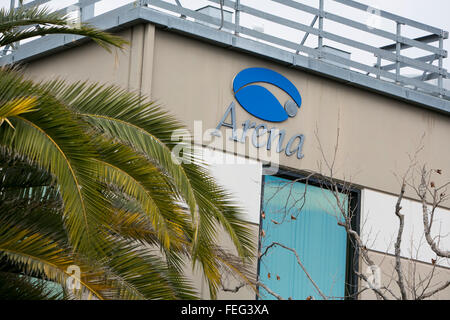 A logo sign outside of the headquarters of Arena Pharmaceuticals, Inc ...