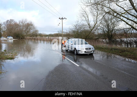 Motorist being rescued from flood water on a flooded slash lane in ...