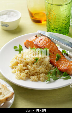 salmon with bulgur, food close-up Stock Photo - Alamy