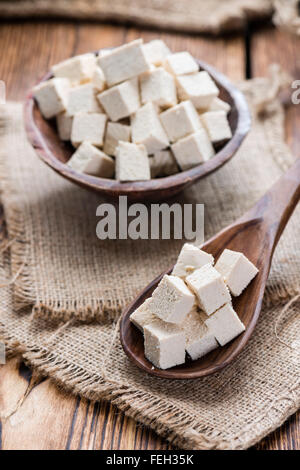 Block of fresh Tofu on wooden background (close-up shot Stock Photo - Alamy