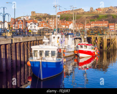 Fishing boats at New Quay Wharf in Whitby harbour North Yorkshire UK ...