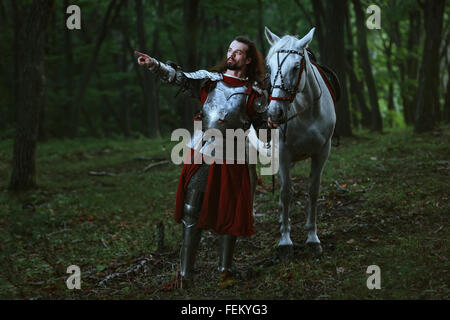 Knight in forest Stock Photo - Alamy