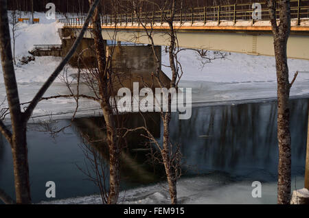 A car running on snow river at sunrise in Mohe County, China Stock ...