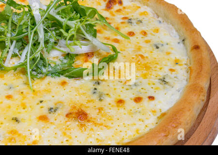Four kinds of cheese pizza, wooden background, low key Stock Photo - Alamy