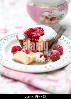 Raspberry tart on a plate, with a fork Stock Photo - Alamy