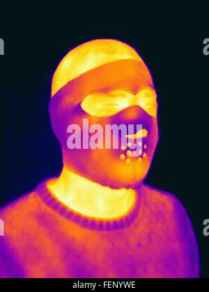 Unrecognizable black man wearing a mask to protect himself from the ...