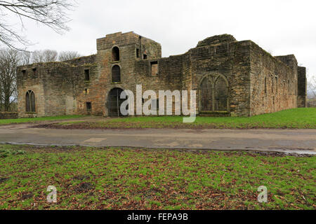 UK, Cumbria, Workington, Ruins of Workington Hall, overgrown courtyard ...