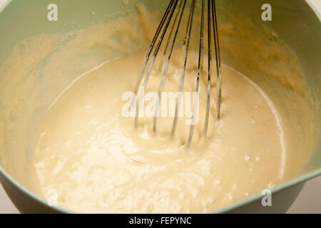 Preparing batter for pancakes Stock Photo - Alamy