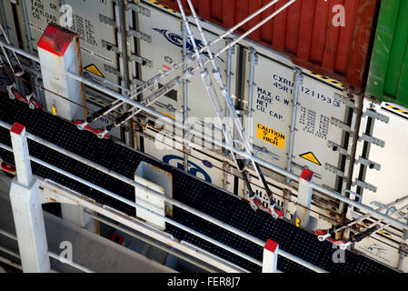 Container shipments. Rods lashed to the vessel secure containers on ...