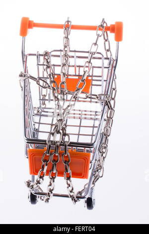 Chained shopping cart in white background Stock Photo - Alamy