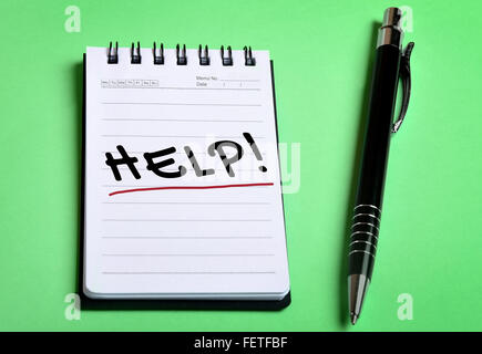 Help word on notebook page Stock Photo - Alamy