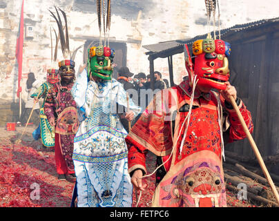 Wuyuan. 9th Feb, 2016. Folk artists perform Nuo dance in Wuyuan County ...