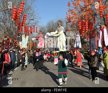 Citizens come to a Spring Festival temple fair in Suining city in ...