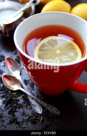 Cup of lemon tea in an autumn setting Stock Photo - Alamy