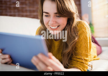 Pretty woman using tablet Stock Photo - Alamy