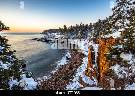 Snow covered Monument Cove in winter in Acadia National Park, Mount ...
