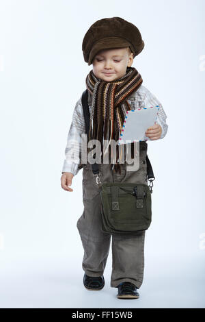 photo of little funny boy with letter Stock Photo - Alamy