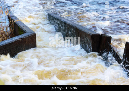 A small fish ladder or salmon ladder to help fish migrate past a dam ...