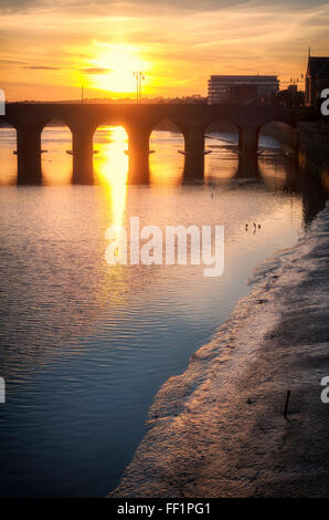 Town of Barnstaple by sunset, view of river Taw, clock tower and The ...