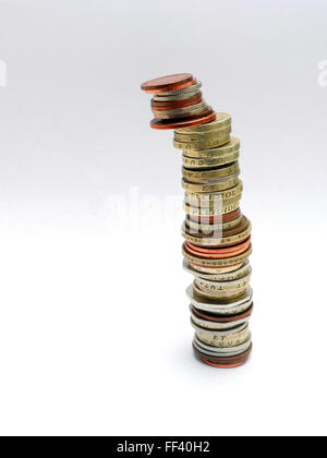 British coins in a pile collapsing Stock Photo - Alamy