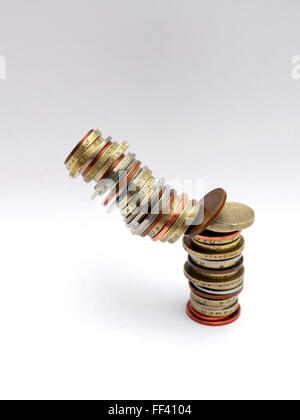 British coins in a pile collapsing Stock Photo - Alamy