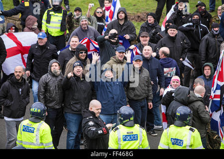 Facist supporters taunting the Anti Facist demonstrators from behind ...