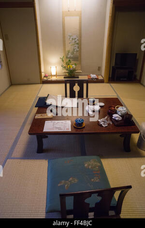 Japanese tea service in Hakone, Japan with zabuton cushions, a Chabudai ...