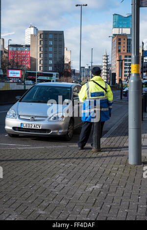 Civil Enforcement Officer on parking duty on Great Yarmouth street ...