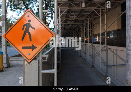 Covered Scaffolding Over Pedestrian Walkway. High quality photo Stock ...