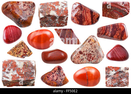 set of red natural mineral stones and gemstones isolated on white ...