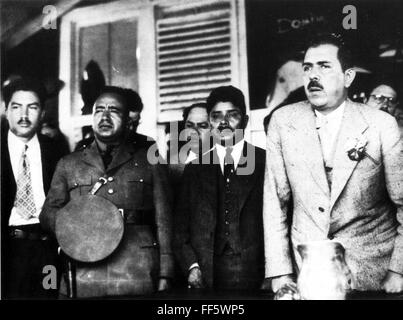 Mexican President Lazaro Cardenas meeting with oil labor leaders. On ...