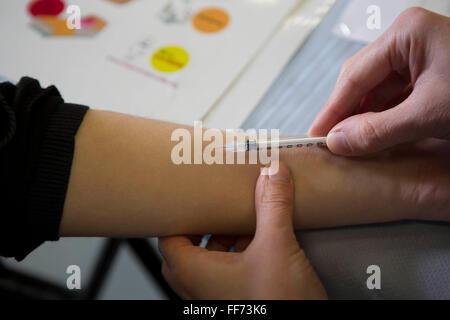 Sarah Murphy, TB Nurse Specialist, performs an intra-dermal injection ...