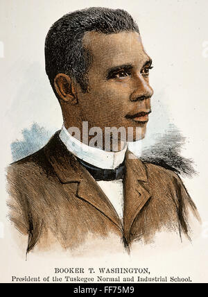 Booker T. Washington (1856-1915), writing at his desk. His ...