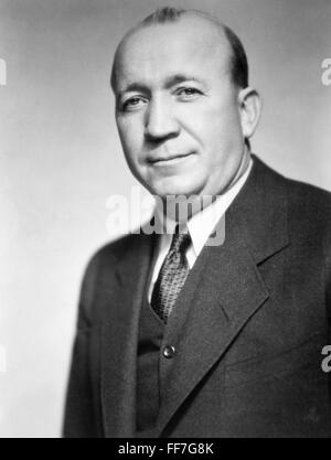 KNUTE ROCKNE (1888-1931). /nAmerican football coach. Rockne (left) with ...